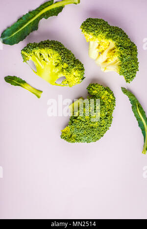 Fresh broccoli isolated on pink background, top view. Organic ...