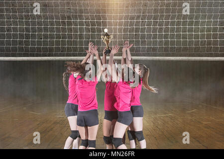 Woman volleyball Players celebrating victory and gold medal Stock Photo ...