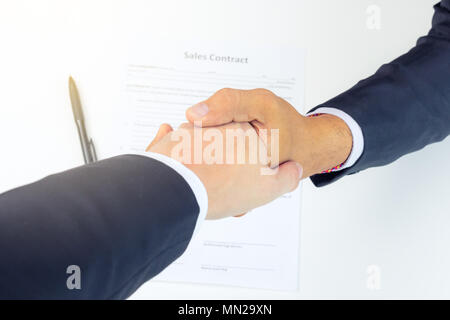 Business contract, agreement was signed by two business man shaking ...
