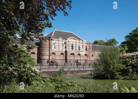 Horse riders outside the Royal Stables building (Koninklijke Stallen ...