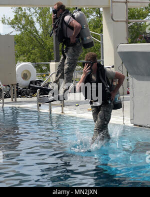 U.S. Air Force diving students joke with one another before a Stock ...