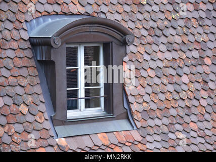 garret window on a roof of the old house Stock Photo - Alamy