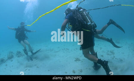 Sri Lanka Navy (SLN) Divers dive with Mobile Diving Salvage Unit One ...
