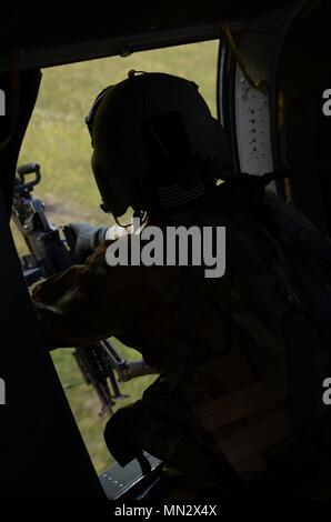 A gunner from 2nd Assault Helicopter Battalion, 82nd Combat Aviation ...