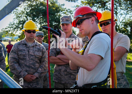 Airmen from the 375th Communications Squadron brief Maj. Gen. Kenneth T ...