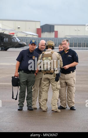 An AMO agent briefs members of the Calcasieu Parish Sheriff's Office ...