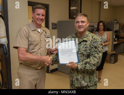 PANAMA CITY, Florida - Navy Diver Steven Askew is promoted to the rank ...