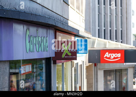 Argos logo, shop sign signs logos England UK Stock Photo - Alamy