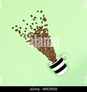 Creative pop art cup of coffee pastel coloured background. Coffee mug ...