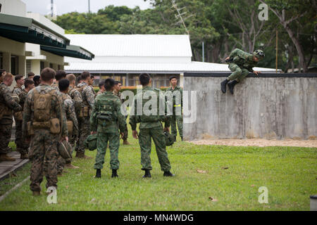 Singapore Armed Forces Soldiers demonstrate how to navigate the ...