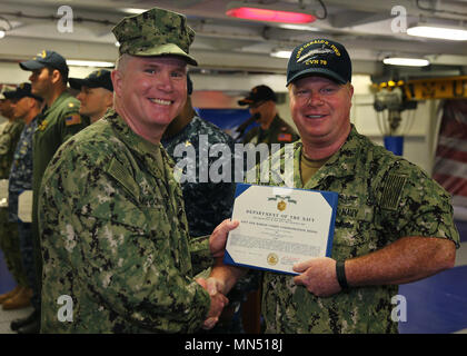 U.S. Marine Corps Capt. Lee Stuckey (right), the commanding officer of ...