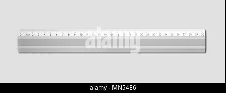 Steel metallic ruler isolated on dark grey background. Metal ruler ...