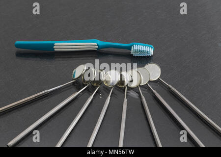 Cutlery treatment at the dentist Stock Photo - Alamy