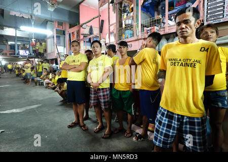 Inmates in their crowded cell block in the Manila City Jail in Manila ...