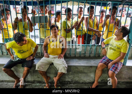 Inmates in their crowded cell block in the Manila City Jail in Manila ...