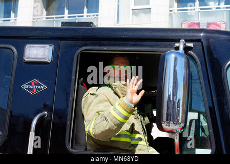 A fireman in the St. Patrick's Day Parade in Bellingham, Washington on ...