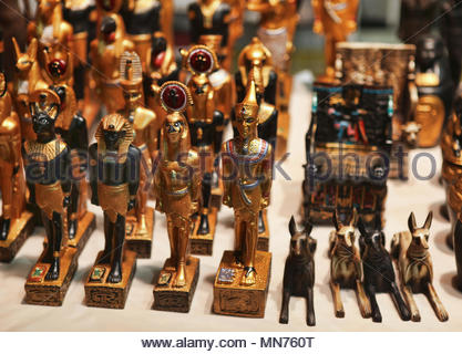 Egyptian statues of Bastet, Anubis, Atum, Hathor, Ra, and Seth stand ...