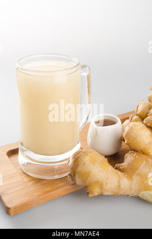 Ginger tea or Ginger tea with haney on background Stock Photo - Alamy