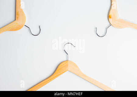 Wood Hangers flat lay image on white background Stock Photo - Alamy