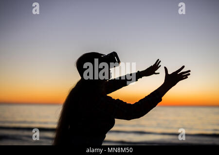 Virtual Realty is here Man wearing virtual reality glasses on the over ...