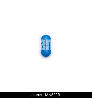 Single blue pill isolated on white background Stock Photo - Alamy