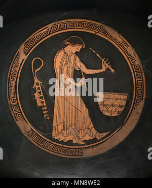 Flutist in front of a food basket depicted in the Attic red-figure ...