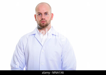 Young bald muscular man doctor thinking while looking up Stock Photo ...