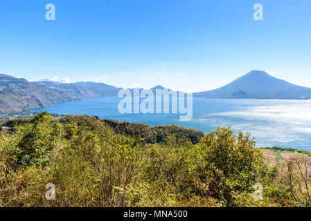 Panorama view of the lake Atitlan and volcanos in the highlands of ...