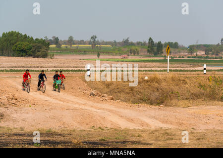 Group of joyful people with bicycles outside Stock Photo - Alamy