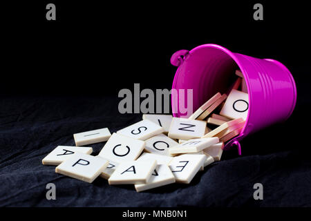 letter blocks in a bucket Stock Photo - Alamy