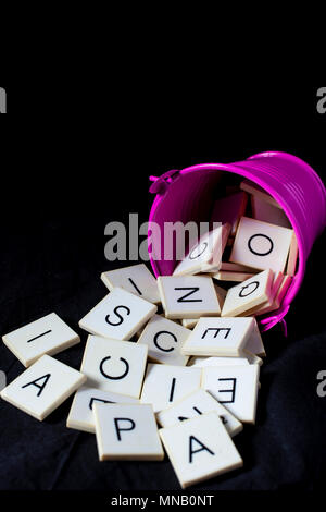 letter blocks in a bucket Stock Photo - Alamy