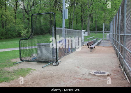 Empty bench in baseball dugout Stock Photo - Alamy