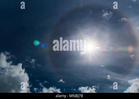 Halos are atmospheric phenomena created by light which is reflected or ...