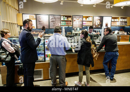 queue line of people, Starbucks cafe, Terminal three departure Stock ...