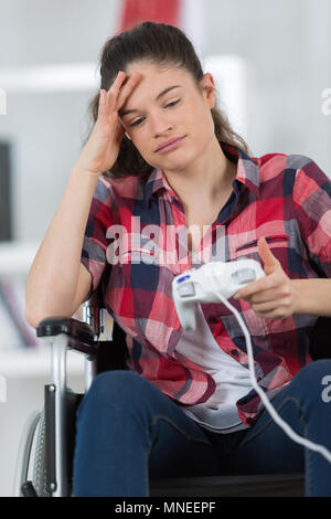 disabled female playing video game Stock Photo - Alamy