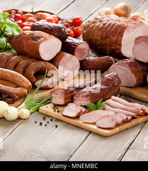 cold cuts of different types of cooked meat on plate Stock Photo - Alamy