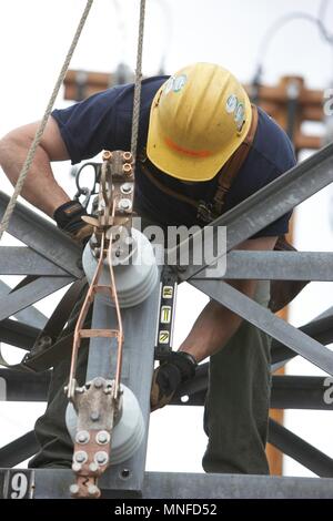 Electric power lineman installing new lines in Boise Idaho Stock Photo ...