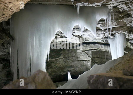 Ice stalactites, stalagmites and columns in cave, ice bodies, ice ...