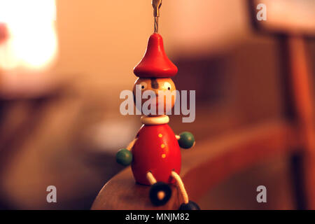Pinocchio seating on the office chair Stock Photo - Alamy