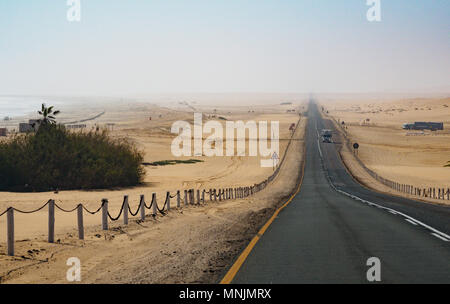 Road Swakopmund-Walvis Bay with red dunes, Namibia Stock Photo - Alamy