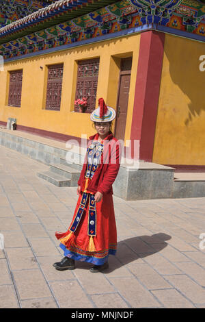 Traditional dress of the Yugur ethnic minority, Mati Si, Gansu, China ...