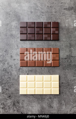 Delicious and sweet chocolate swirls on wooden background Stock Photo ...