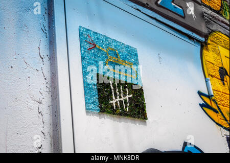 Bottle Alley broken glass mosaic walls designed by Sidney Little in ...