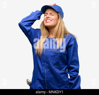 A horrified female construction worker Stock Photo - Alamy