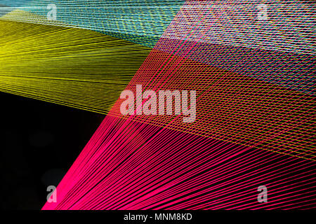 Lines of colourful wool strings as an artistic display Stock Photo - Alamy