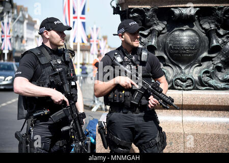 An armed British police officer on duty in Downing street with a full ...