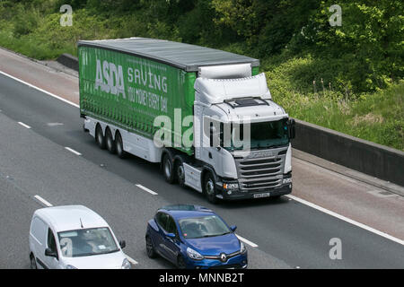 Asda supermarket delivery lorry and trailer overtaking a similar ...