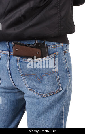 A thief with robbery mask holding a gun isolated against white ...