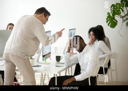 angry boss and stressed employee in the office, punishment Stock Photo ...