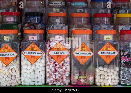 Jars of sweets on shelves at a traditional sweet shop in the Uk Stock ...